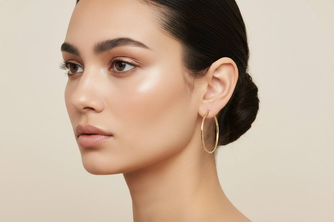 Home Clip on 1 3/4" shiny gold spring back hoop earrings